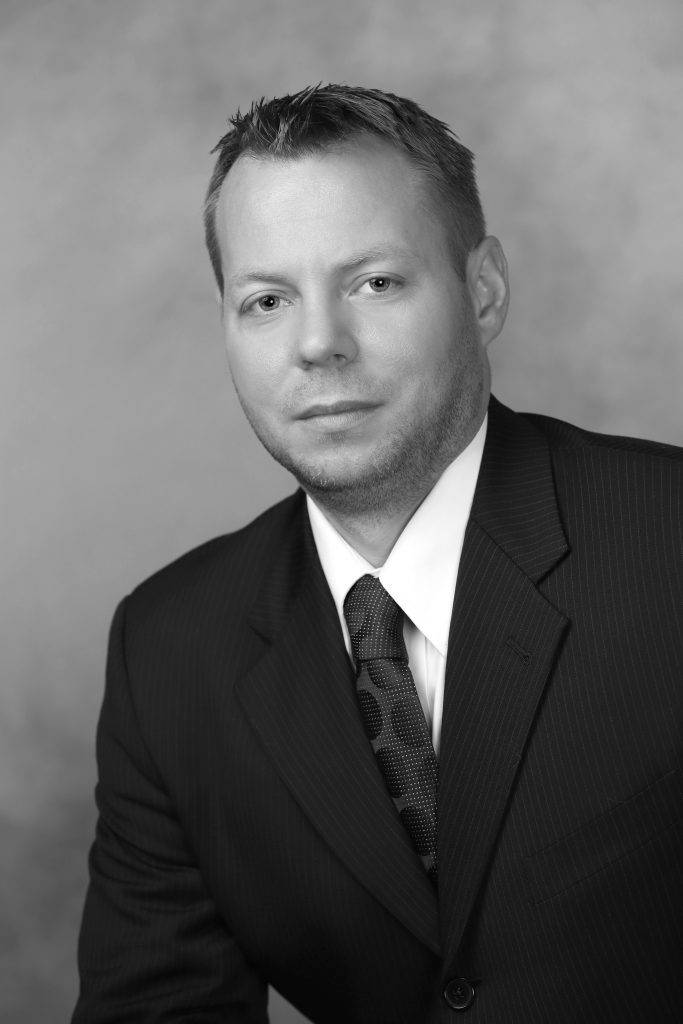 Brett.Headshot_B&W - The Judge